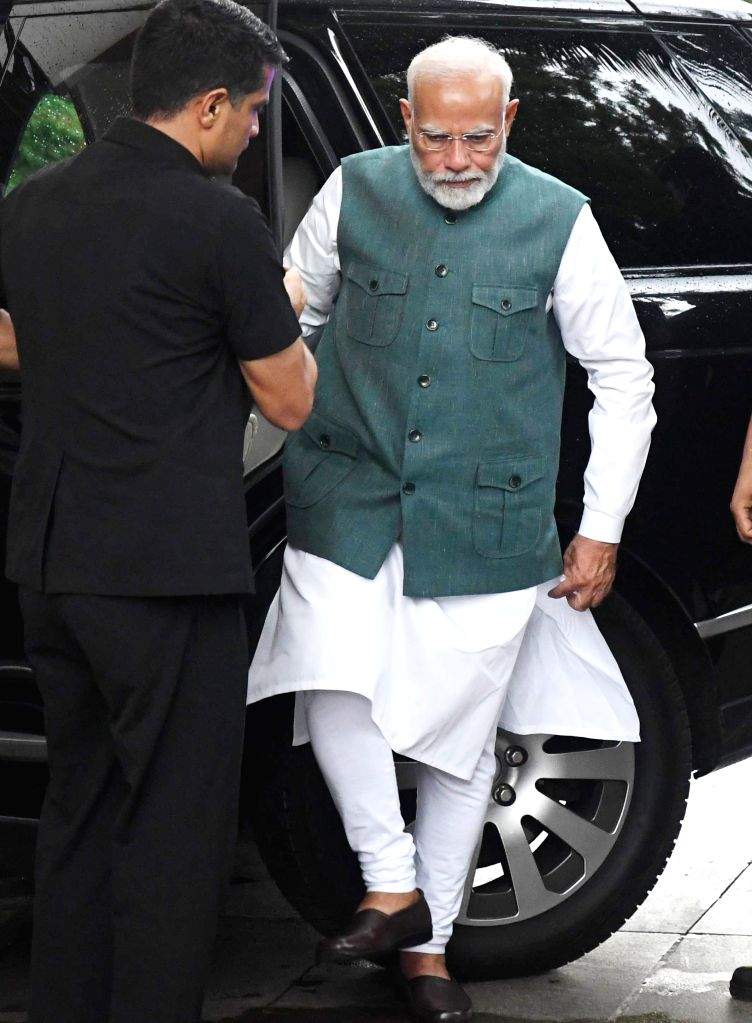 Prime Minister Narendra Modi arrives at party headquarters for Chief ...