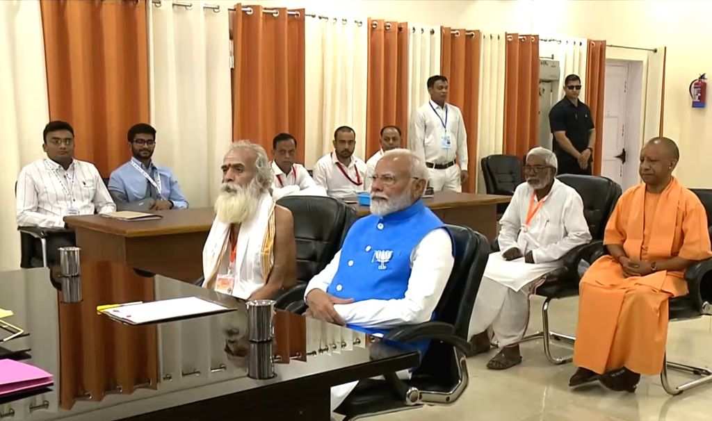 Prime Minister Narendra Modi arrives at the DM office in Varanasi, to ...