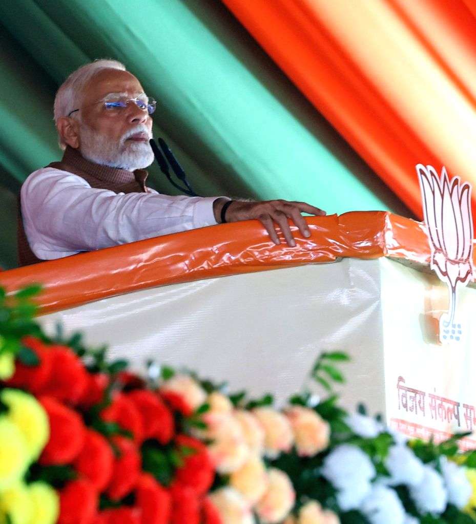 Prime Minister Narendra Modi attends a public meeting for the Jharkhand ...