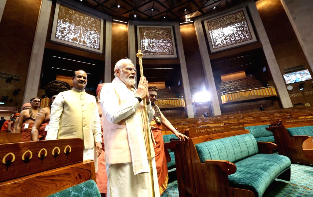 : New Delhi: Prime Minister Narendra Modi carries the 'Sengol' in a ...