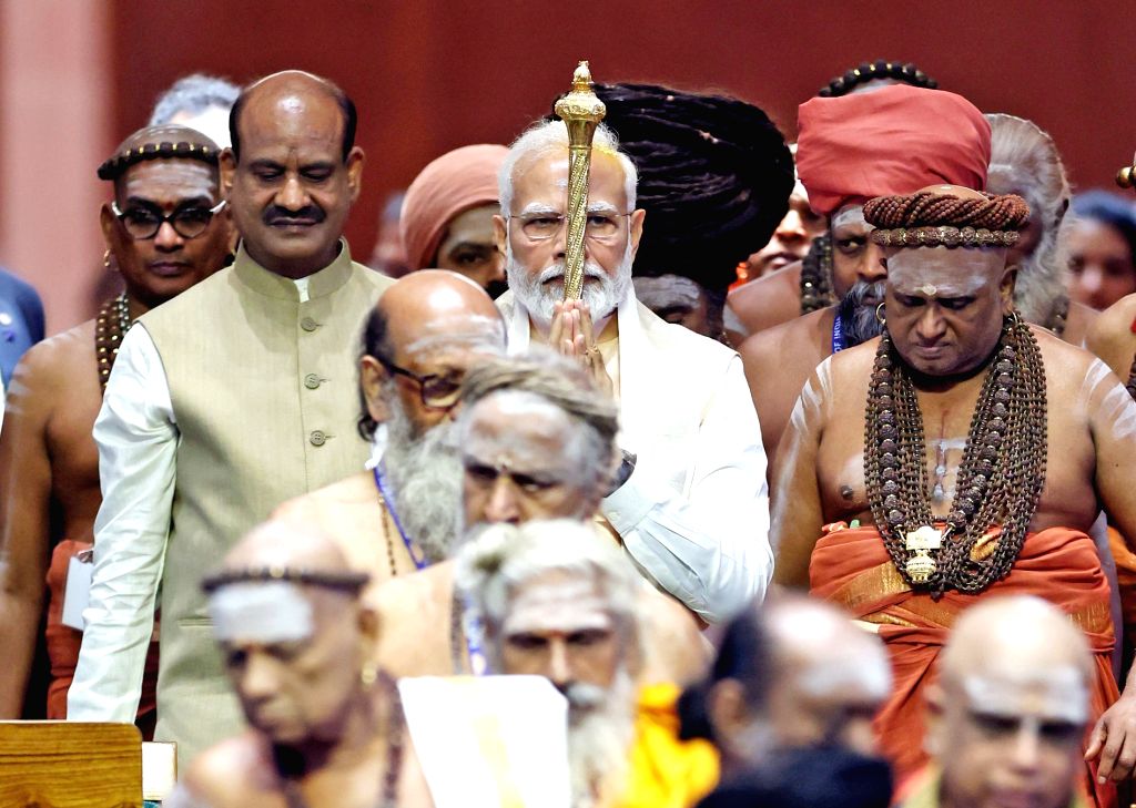 : New Delhi: Prime Minister Narendra Modi carries the 'Sengol' in a ...