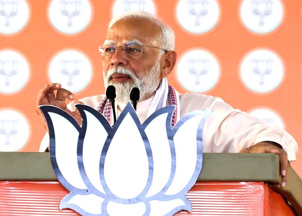 Prime Minister Narendra Modi during a public meeting for Lok Sabha ...