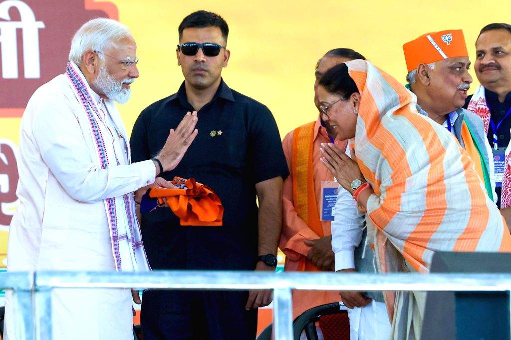 Prime Minister Narendra Modi during a public meeting for Lok Sabha ...