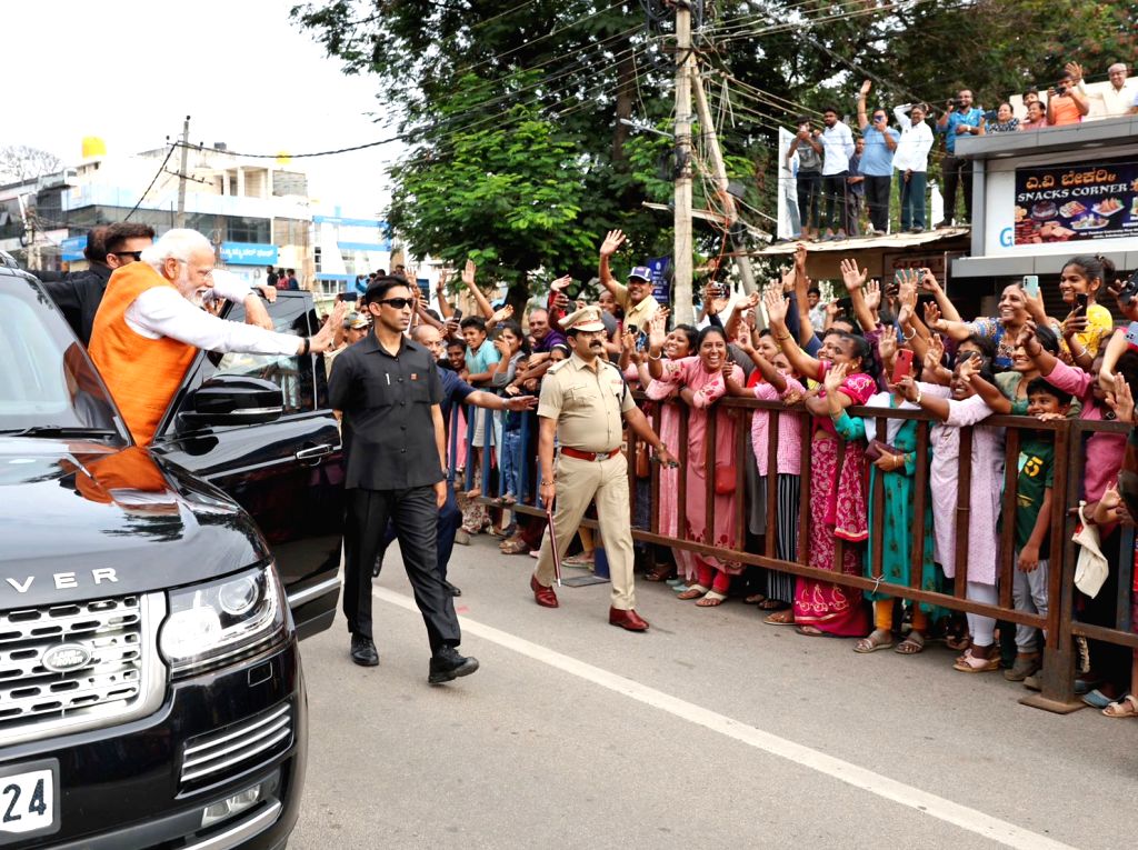 Prime Minister Narendra Modi during a roadshow ahead of Karnataka ...