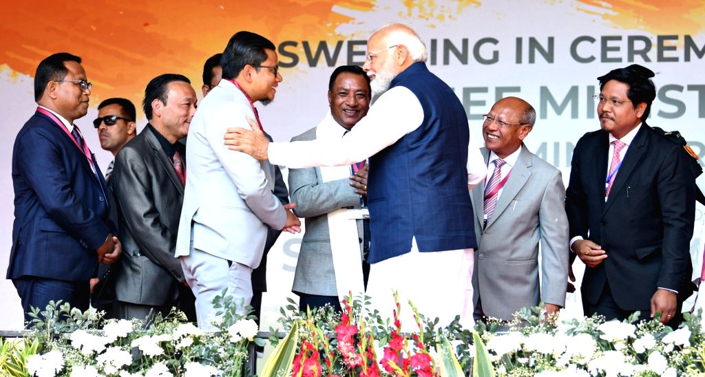 Shillong: Prime Minister Narendra Modi greets newly sworn-in ministers