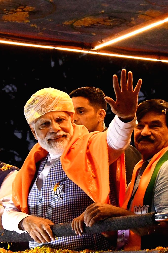 Prime Minister Narendra Modi holds a road show in support of BJP candidates
