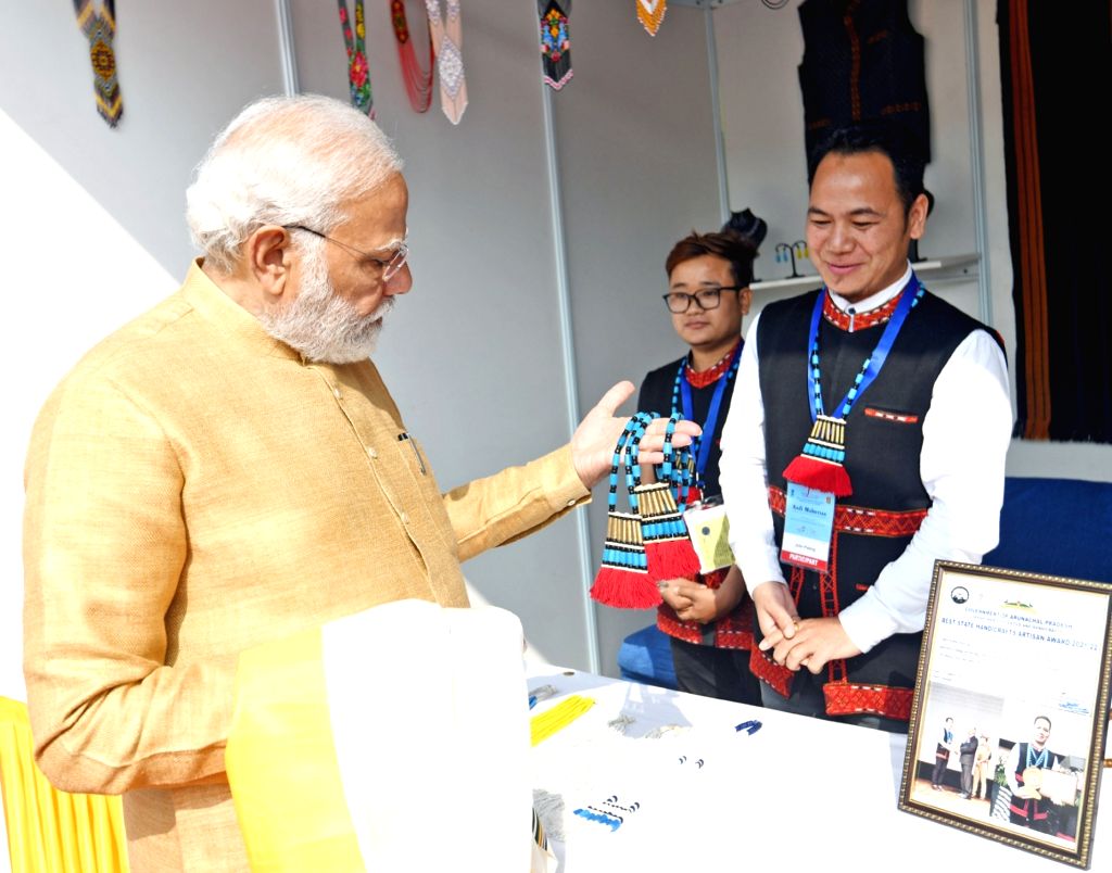 Prime Minister Narendra Modi interacts with tribal artisans