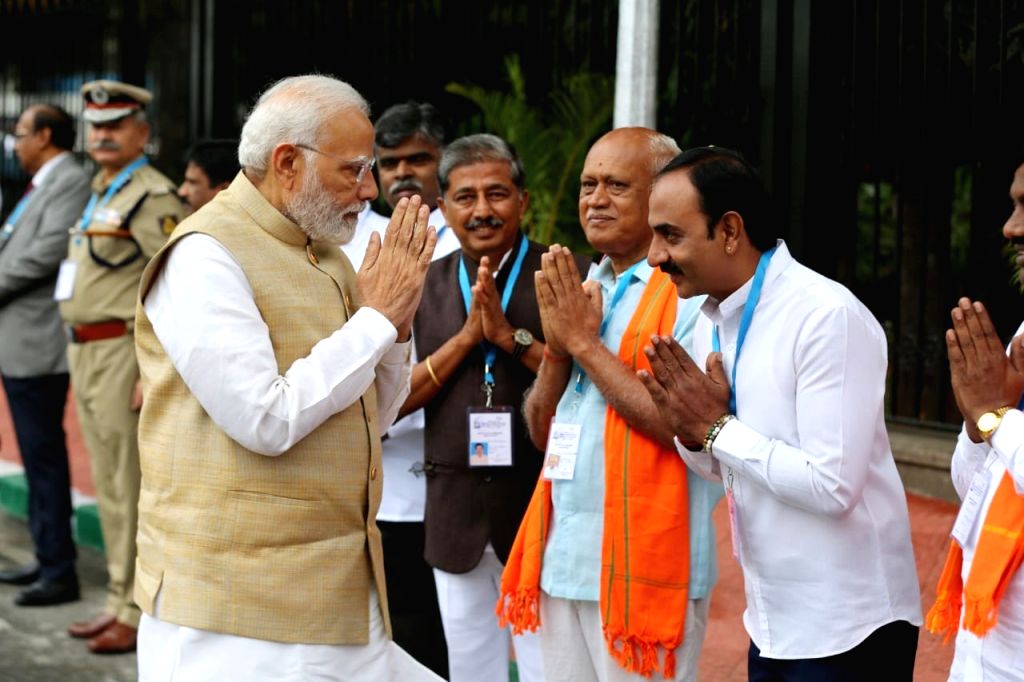Prime Minister Narendra Modi interacts with BJP workers