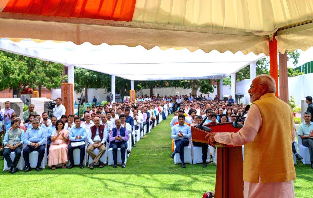 Prime Minister Narendra Modi interacts with PMO staff at South Block