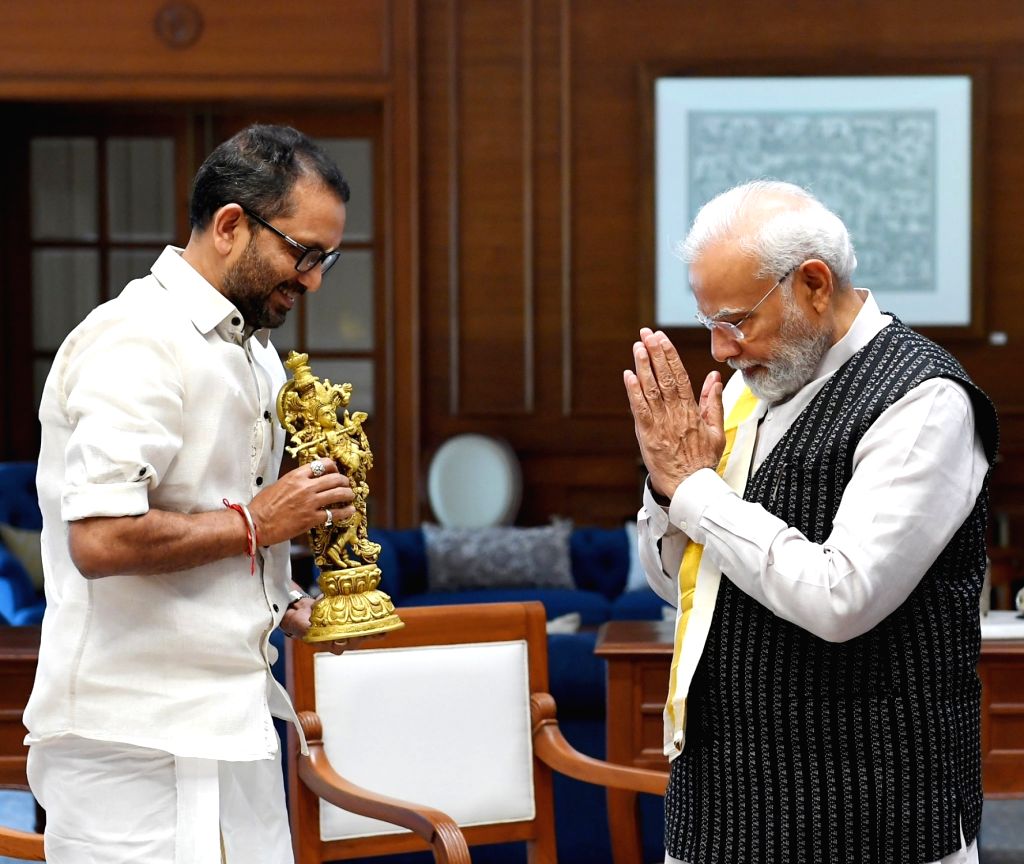 Prime Minister Narendra Modi meets BJP state president K Surendran