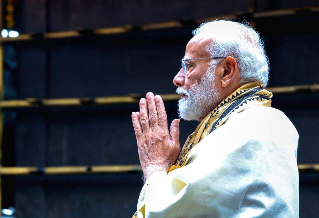 Prime Minister Narendra Modi offers prayers during his visit at ...