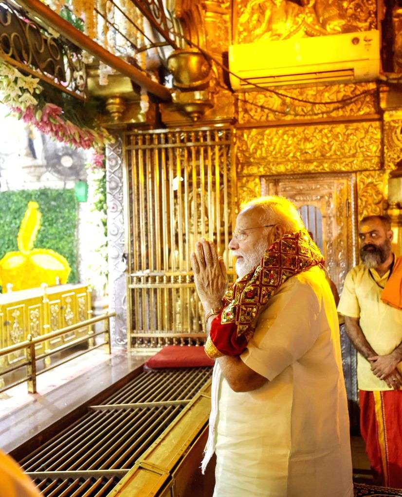 Prime Minister Narendra Modi offers prayers at Goddess Amba temple