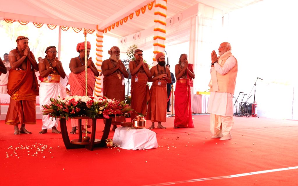 : Prime Minister Narendra Modi pays respect before the 'Sengol' during ...