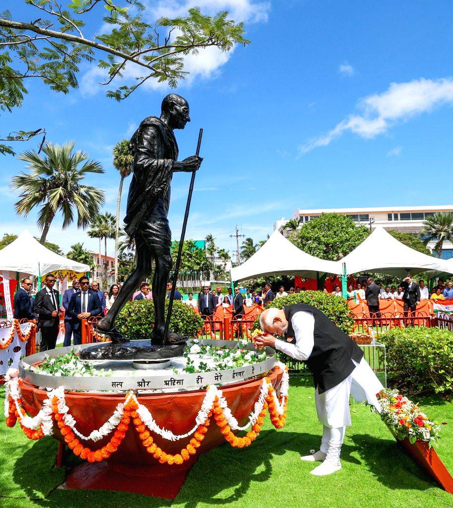 Prime Minister Narendra Modi pays tribute at the statue of Mahatma ...
