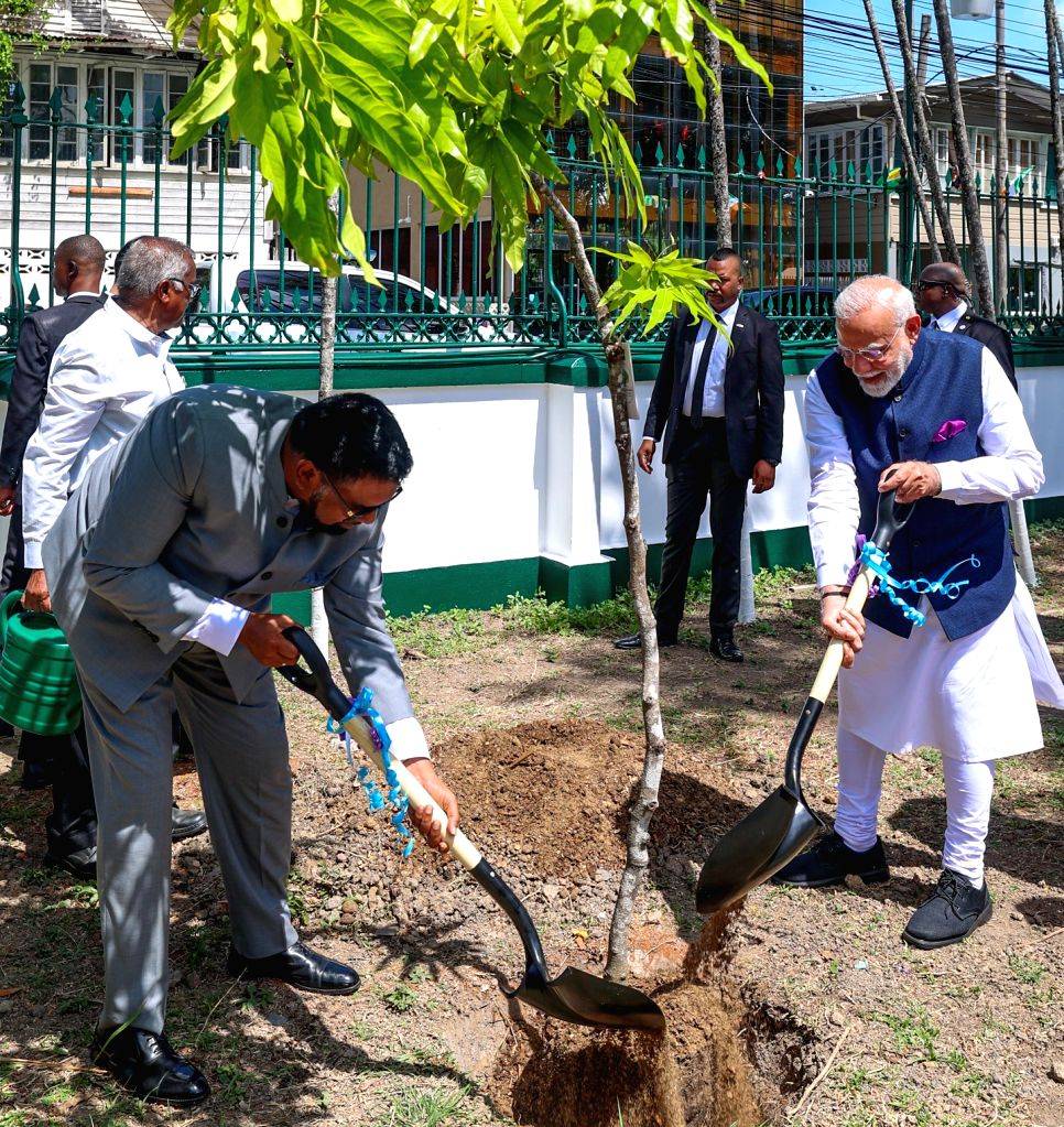 Prime Minister Narendra Modi plants a sapling alongside President of ...