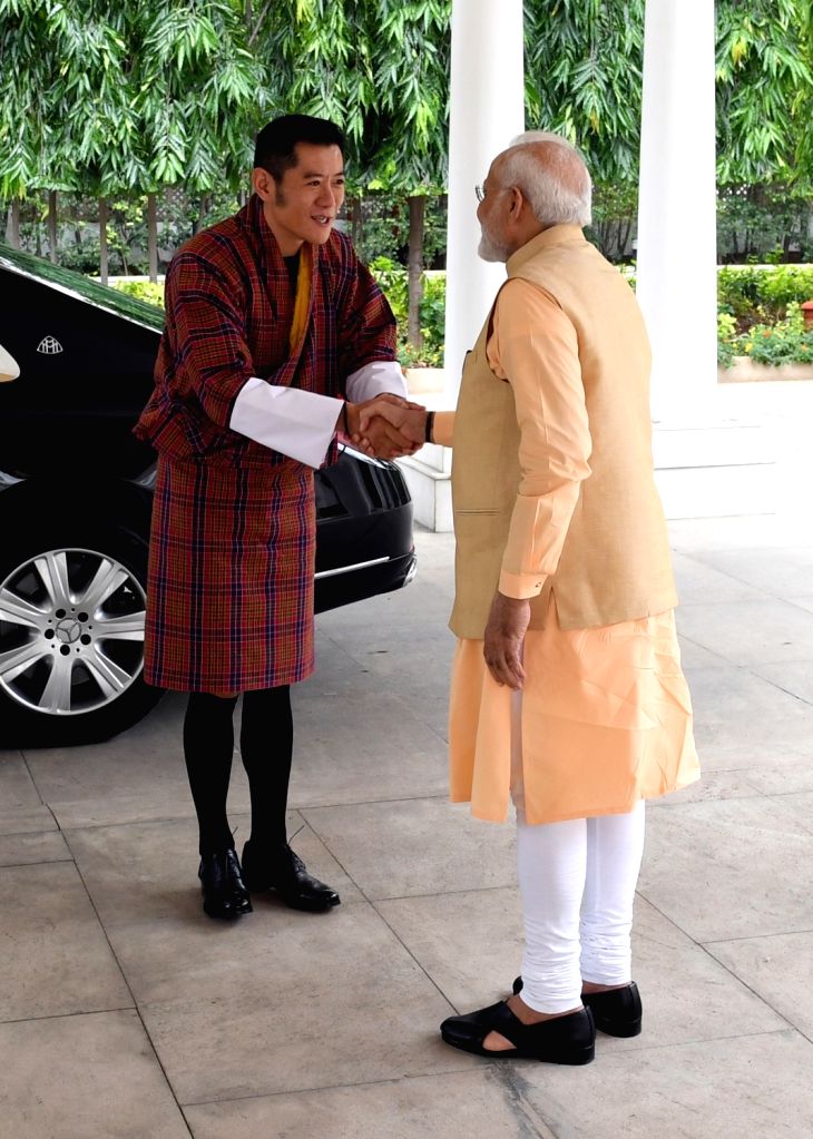 Prime Minister Narendra Modi receives the King of Bhutan