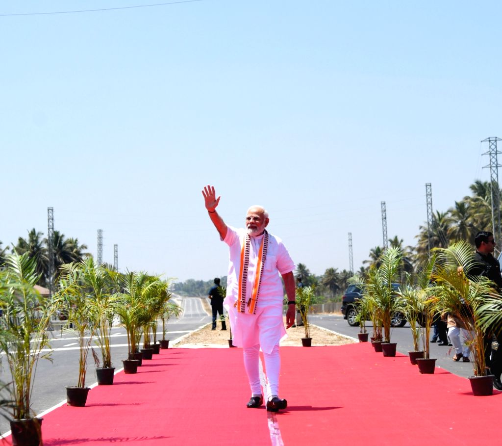PM Modi receives warm welcome from locals and supporters during a roadshow