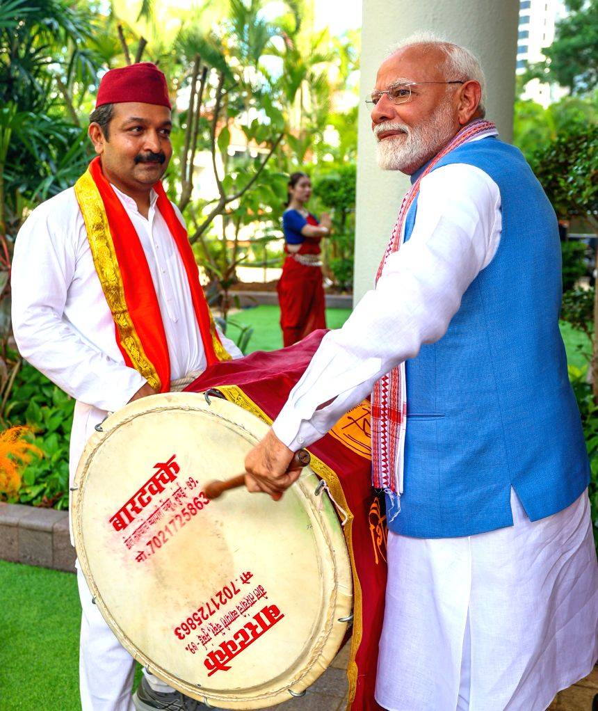 Prime Minister Narendra Modi tries his hand on a 'Dhol' during his ...