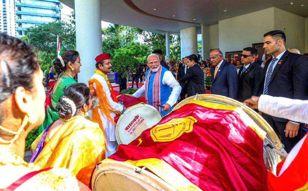 Prime Minister Narendra Modi tries his hand on a 'Dhol' during his ...