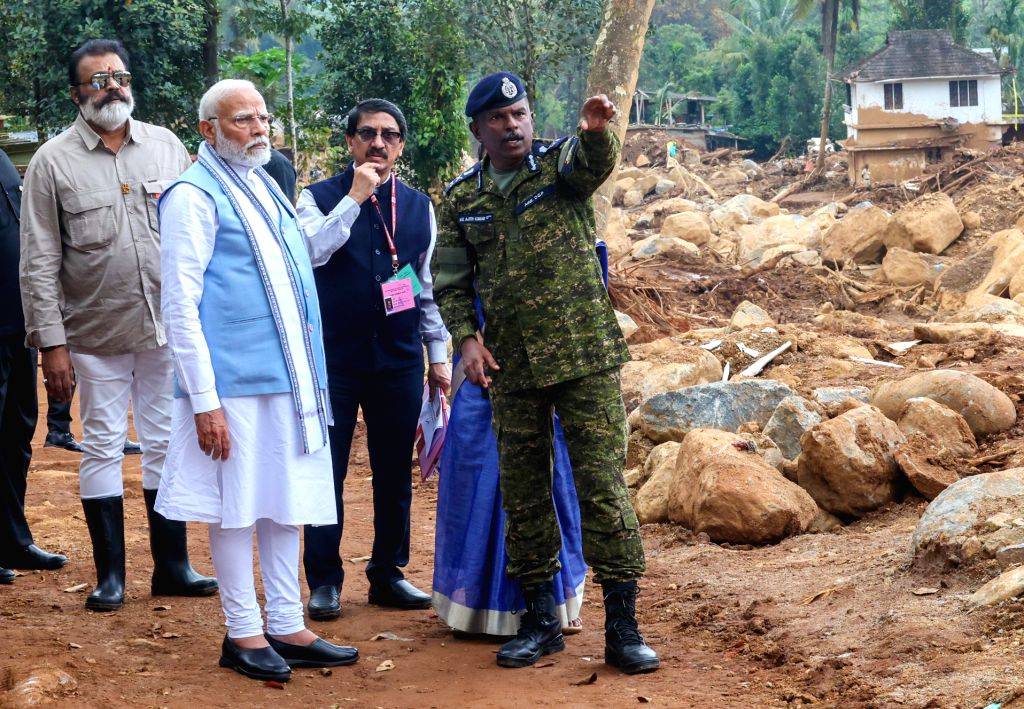 Prime Minister Narendra Modi visits the landslide affected areas