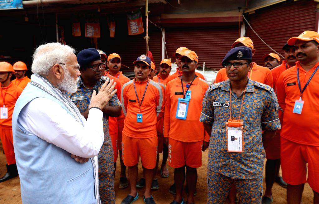 Prime Minister Narendra Modi visits the landslide affected areas