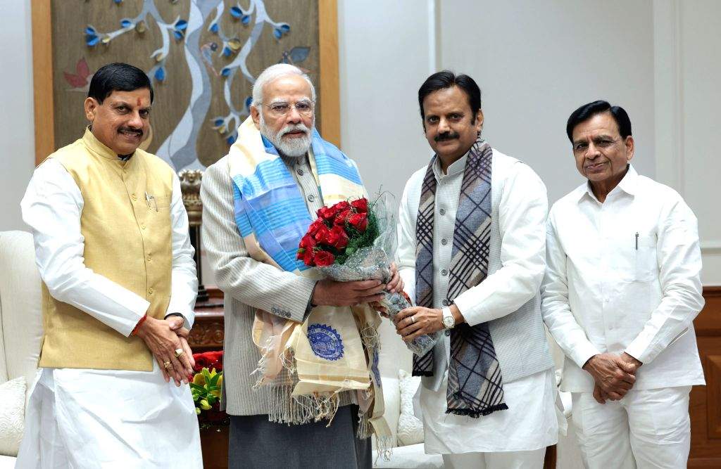Prime Minister Narendra Modi with Madhya Pradesh Chief Minister Mohan ...