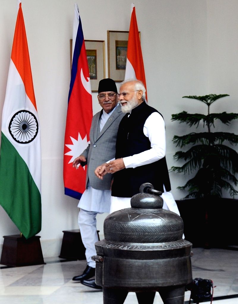 Prime Minister Narendra Modi with Prime Minister of Nepal Pushpa Kamal ...