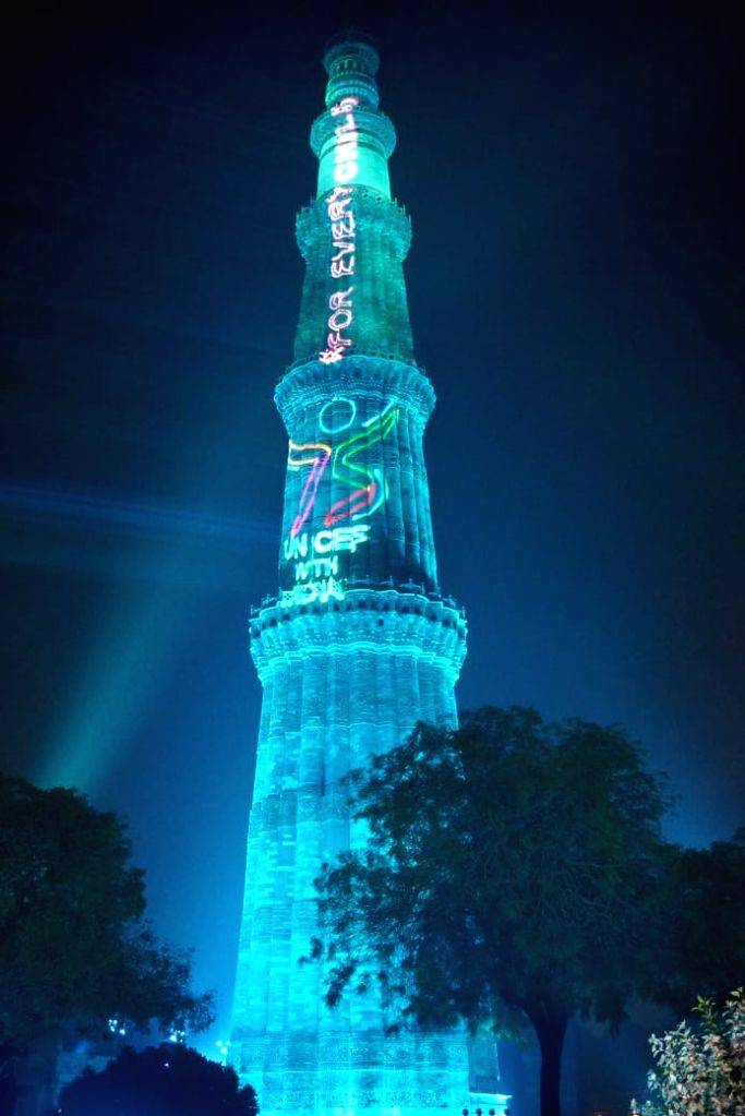 Qutub Minar is illuminated in blue light in solidarity for child rights ...