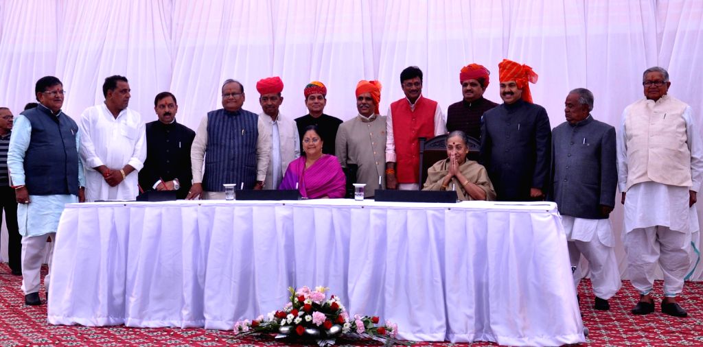 Vasundhara Raje greets Gulab Chand Katariya and Prabhulal Saini after ...