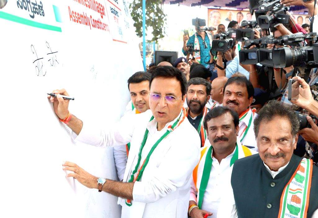 Randeep Surjewala participates in a signature campaign