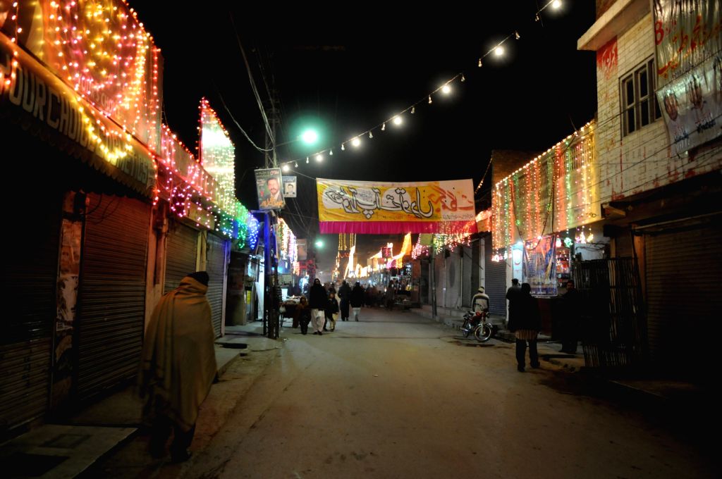 A street is illuminated during celebrations ahead of Eid-e-Milad-un-Nabi