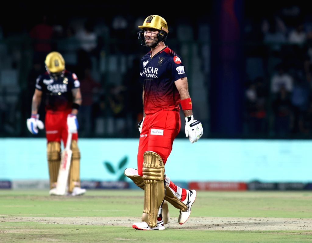 RCB's Glenn Maxwell walks back after his dismissal