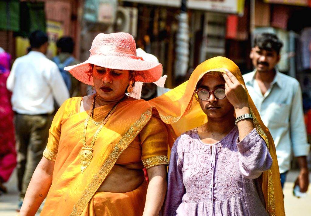 Residents Shield Themselves From Heatwave