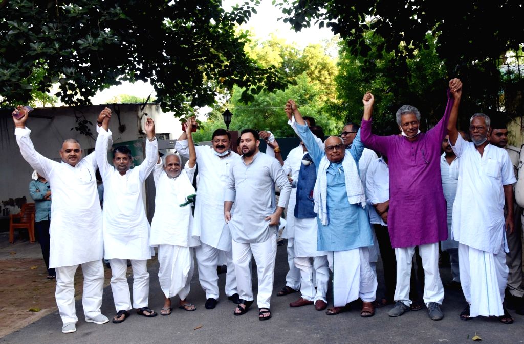 RJD Leader Tejaswi Yadav with grand alliance leaders after a meeting in ...