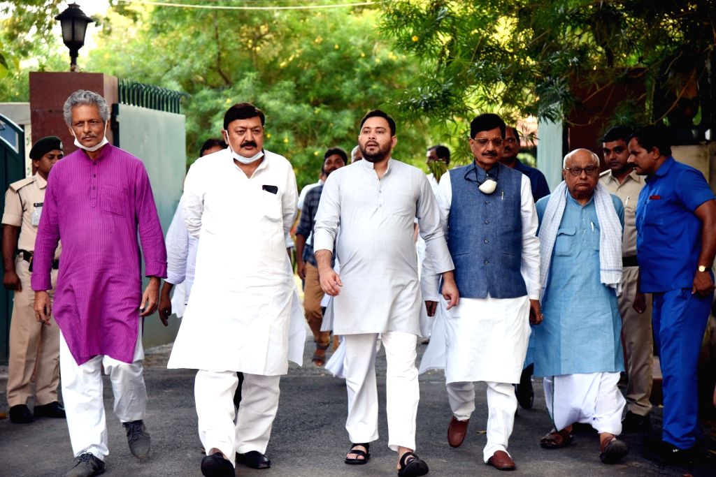 RJD Leader Tejaswi Yadav with grand alliance leaders after a meeting in ...