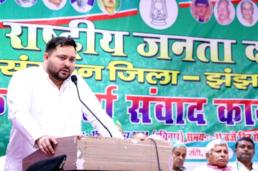 RJD leader Tejashwi Yadav attends a party meeting in Jhanjharpur