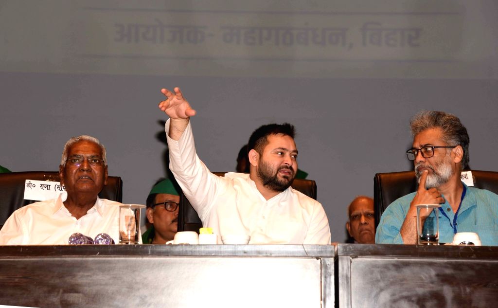 RJD leader Tejashwi Yadav with other party leaders during the grand ...