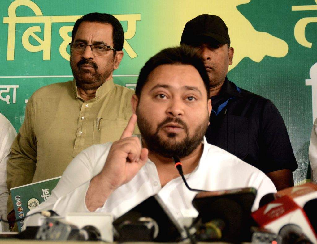 RJD leader Tejashwi Yadav releases 'Parivartan Patra' party manifesto ...