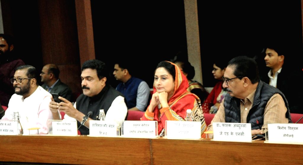SAD MP Harsimrat Kaur and RSP MP NK Premachandran with other floor ...