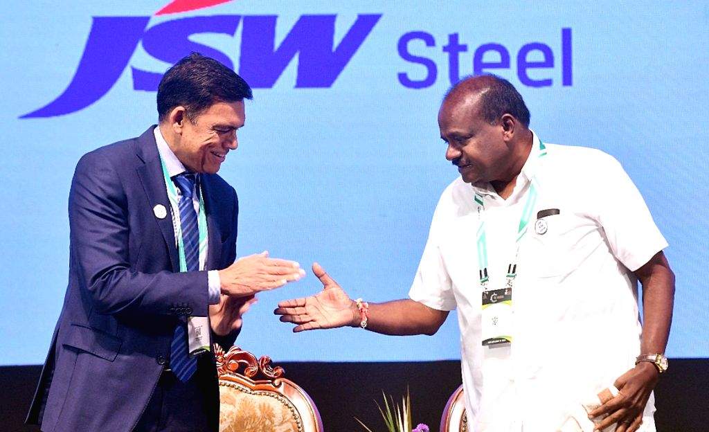 Sajjan Jindal, President of IIM and Chairman of JSW Group, alongside HD ...