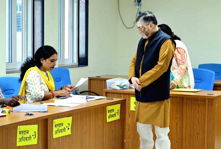 Santosh Gangwar, Governor of Jharkhand, casts his vote at a polling booth