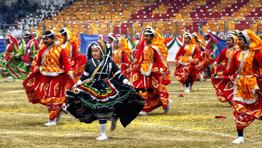New Delhi : School students during the National Flag during the state ...