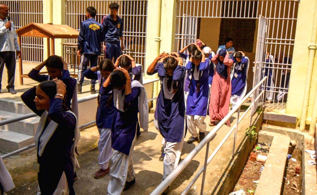 School students participate in a civil defence mock dril
