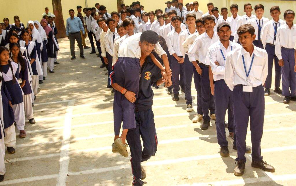 School students participate in a civil defence mock dril