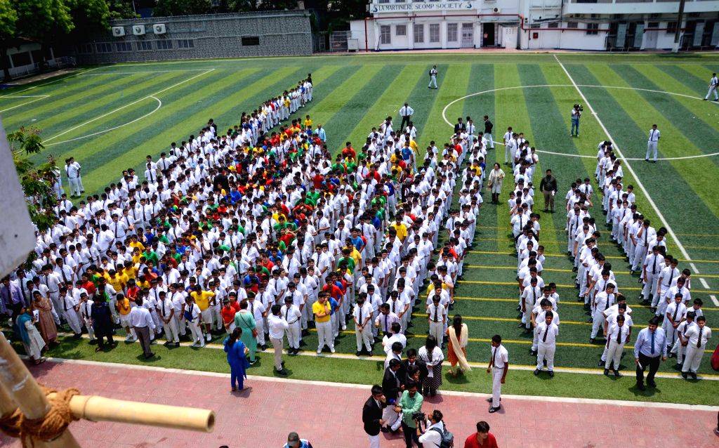 School students participate in a civil defence mock drill