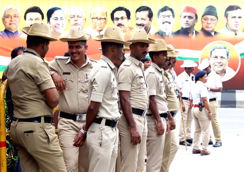 Security personnel outside the venue of the united opposition meeting