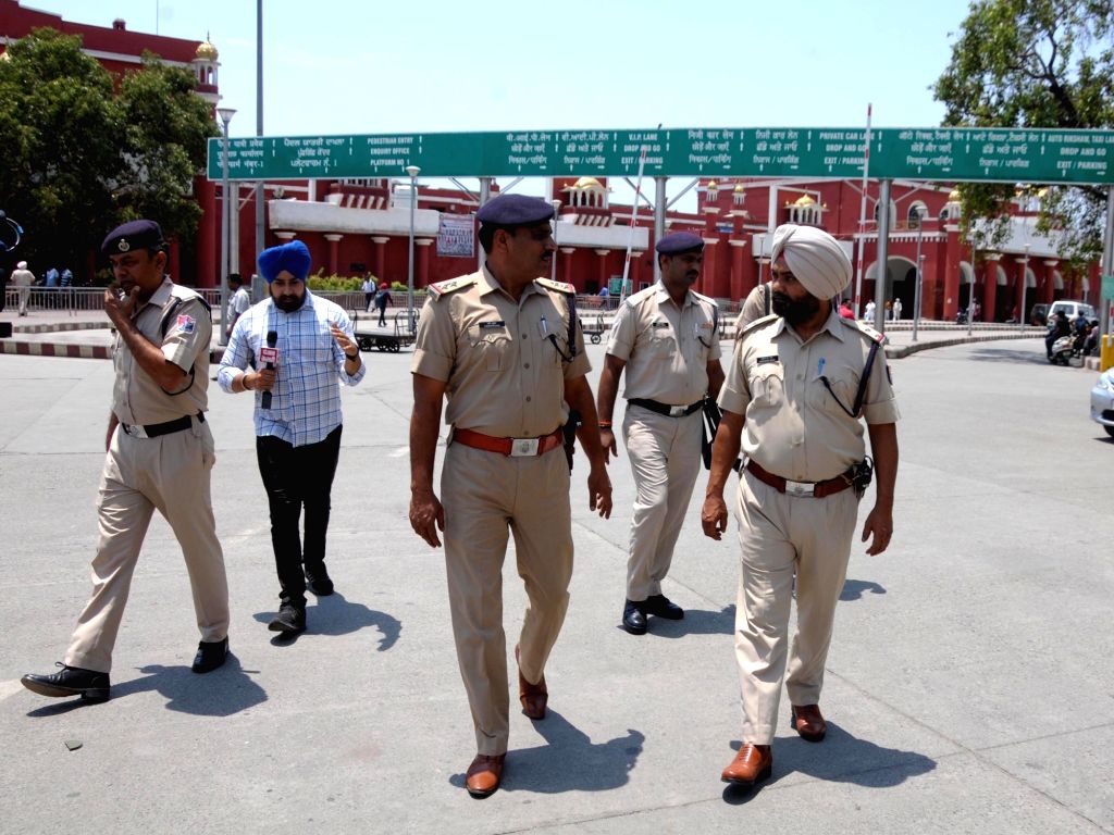 Security personnel stand guard outside Amritsar railway station.