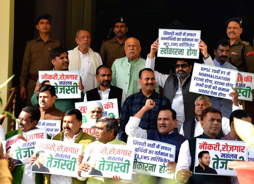 Senior RJD leader Rabri Devi with RJD MLCs stages a protest demanding ...