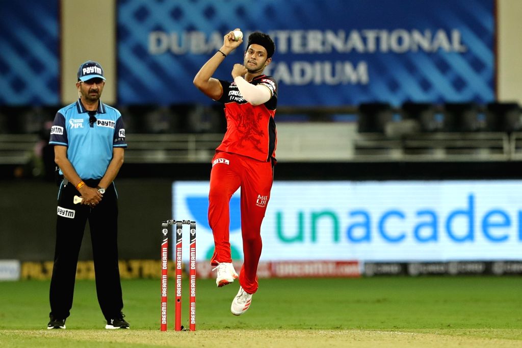 File Photo: Shivam Dube of Royal Challengers Bangalore bowling during ...