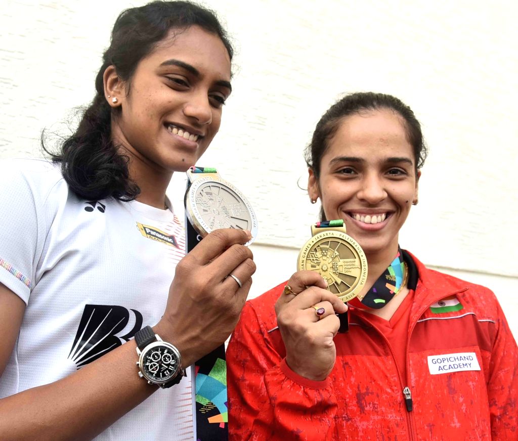 P. Gopichand, PV Sindhu, Saina Nehwal during ac